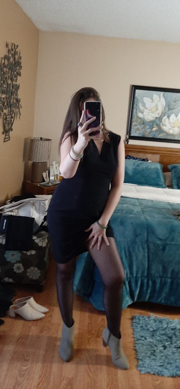 Brunette In Pantyhose Taking Selfie Pantyhoseme