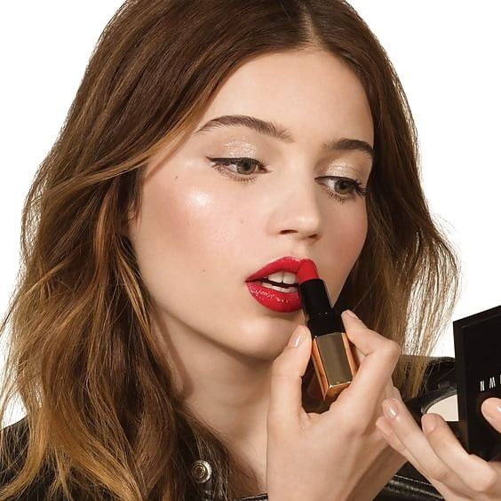 Sexy Female Putting On Lipstick Marilyns
