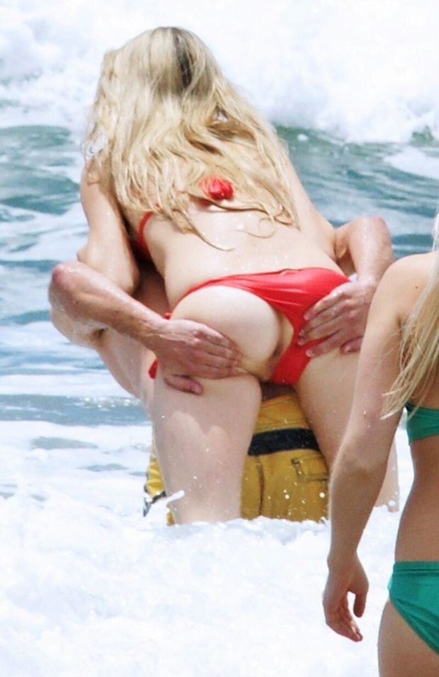 Anus Takes A Peak From Under Bikini Bottom Adm2720